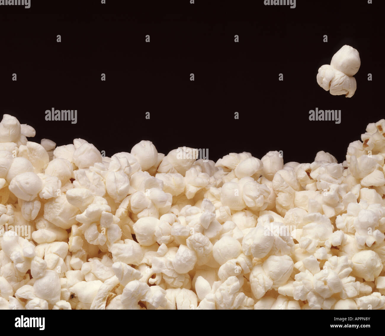 exploding popcorn pop corn kernel Stock Photo - Alamy