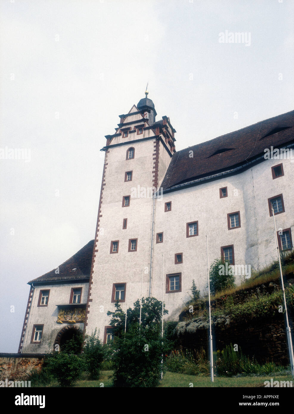 Part of the facade showing the small windows and roofline of the ...