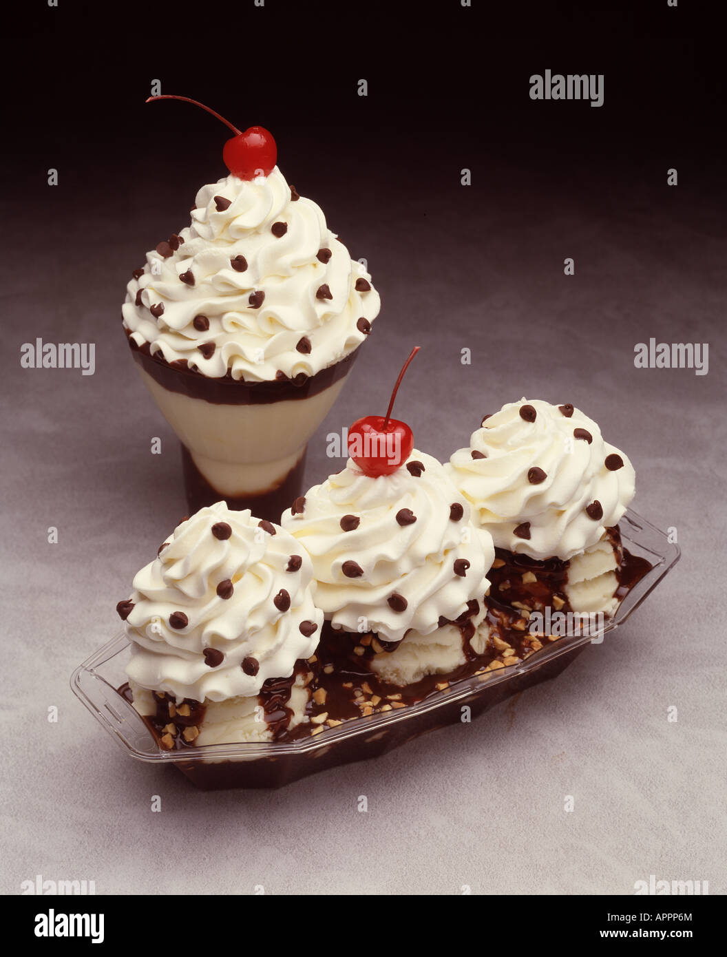 Three dips vanilla ice cream hot fudge sundae whipped cream cherry ...