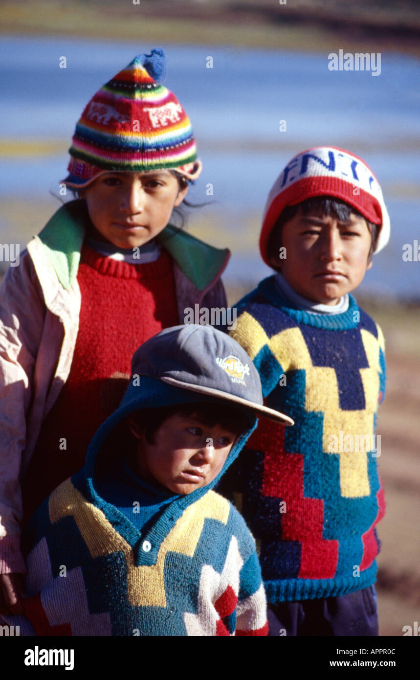 Local kids wrapped up against the Andean chills Stock Photo - Alamy
