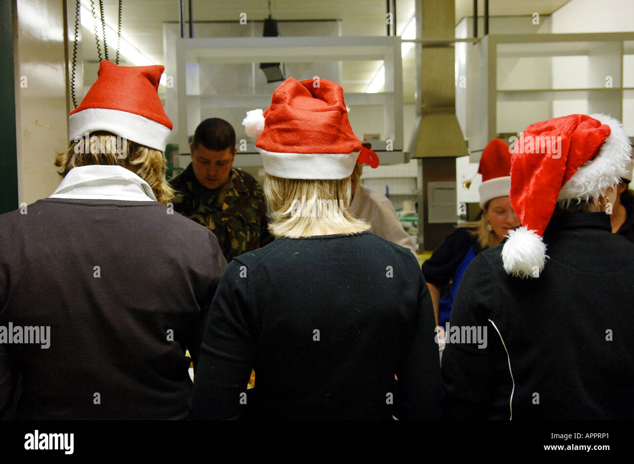 christmas dinner queue eat eating female teachers assistants christmas ...