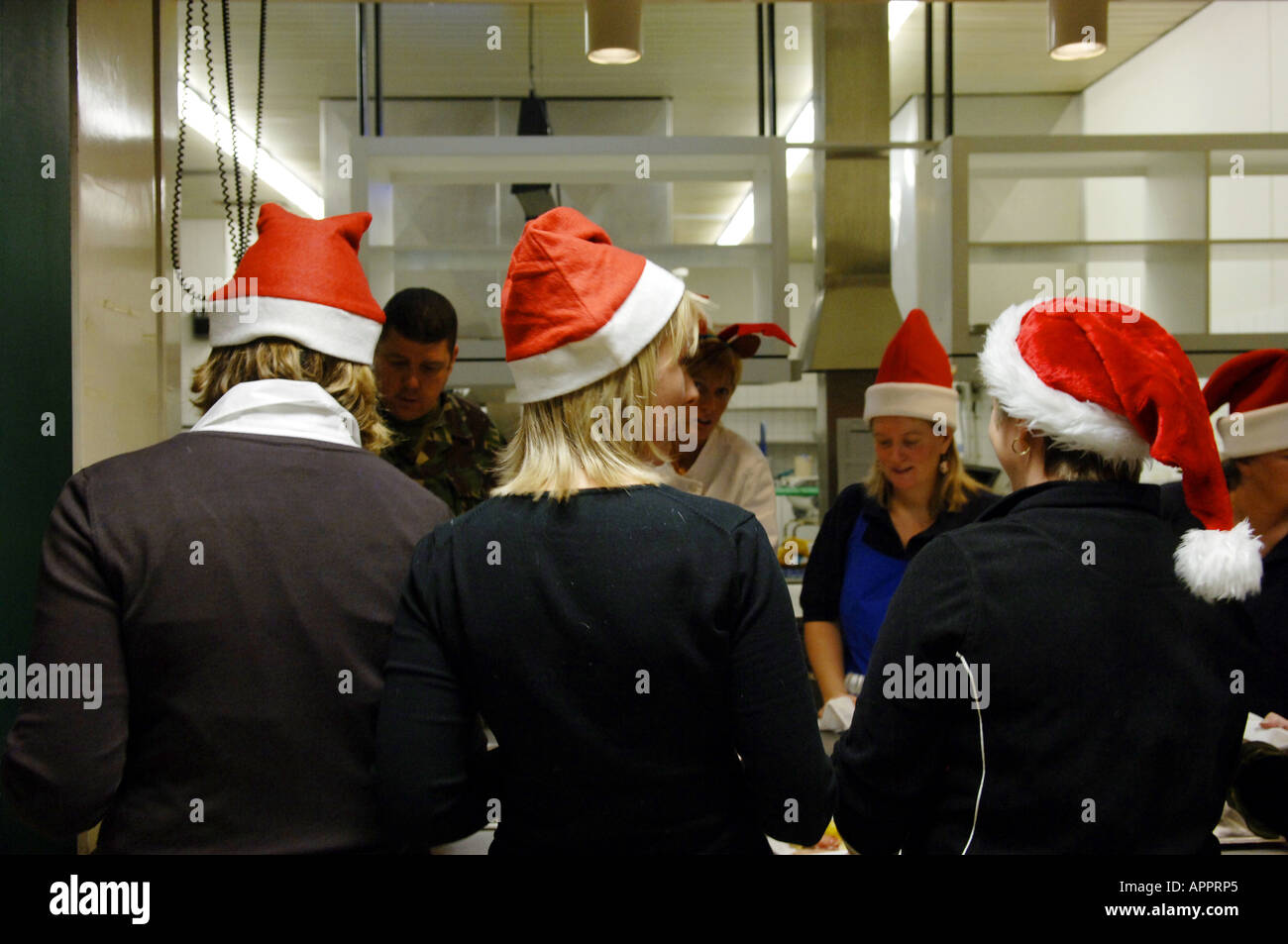 christmas dinner queue eat eating female teachers assistants christmas ...