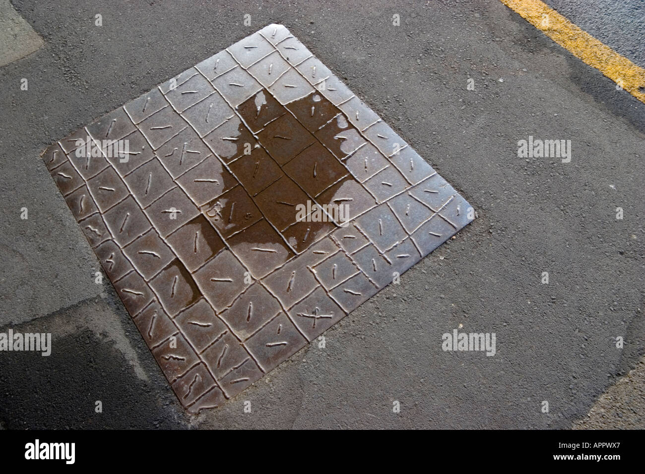 water on metal cover - 2 Stock Photo - Alamy