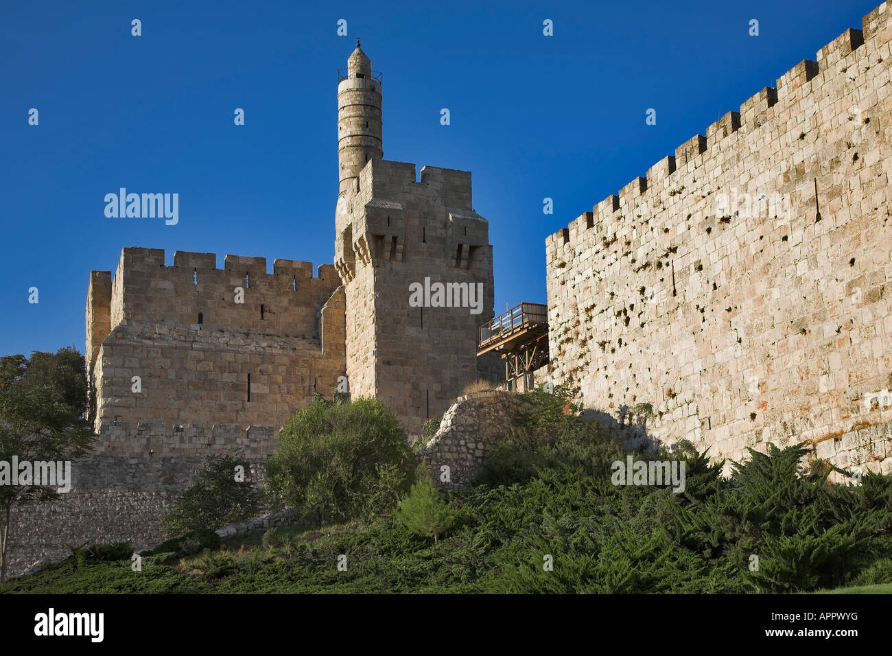 The ancient walls surrounding Old city in Jerusalem and the Tower of ...