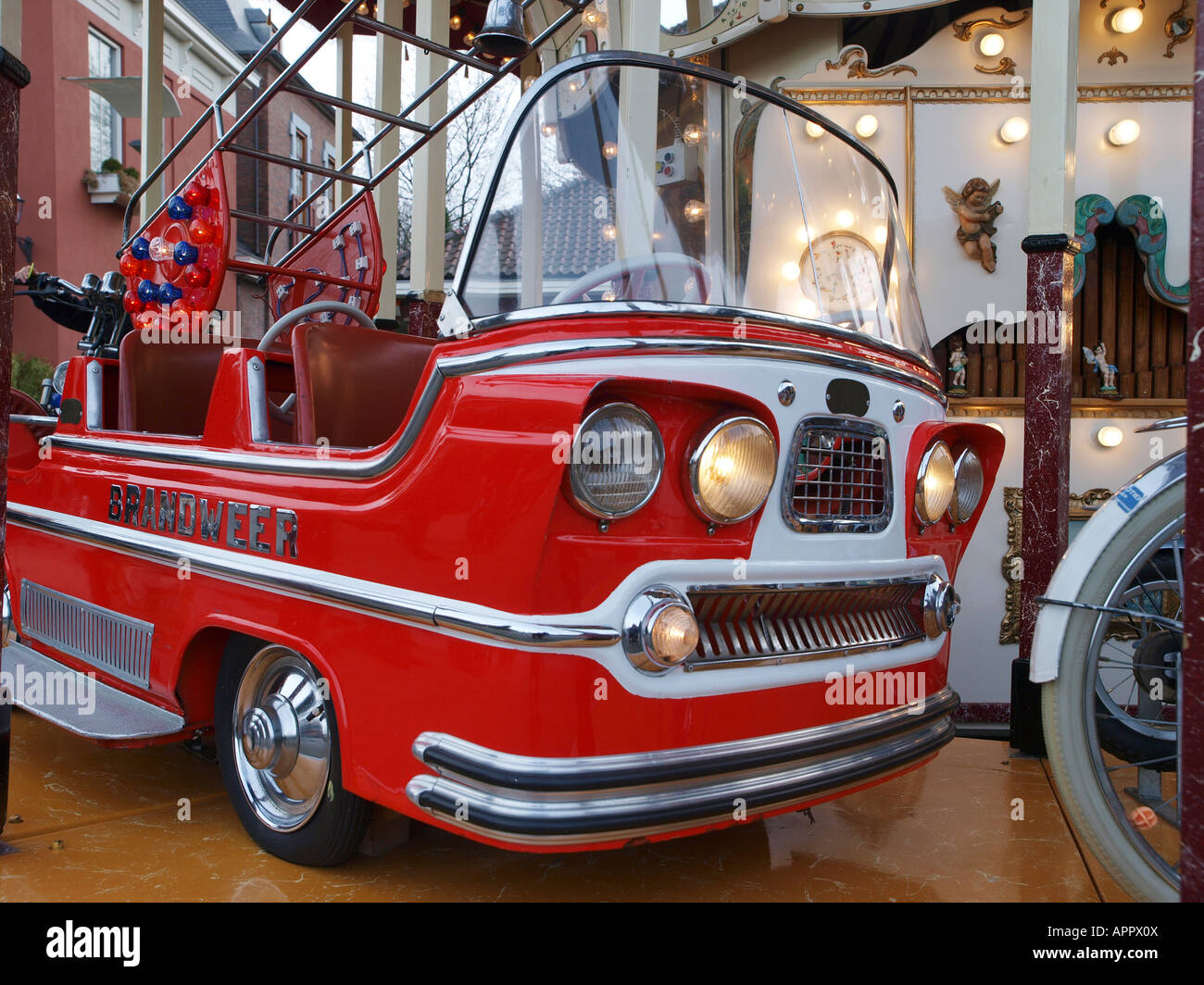miniature red fire engine at fairground carousel Stock Photo - Alamy