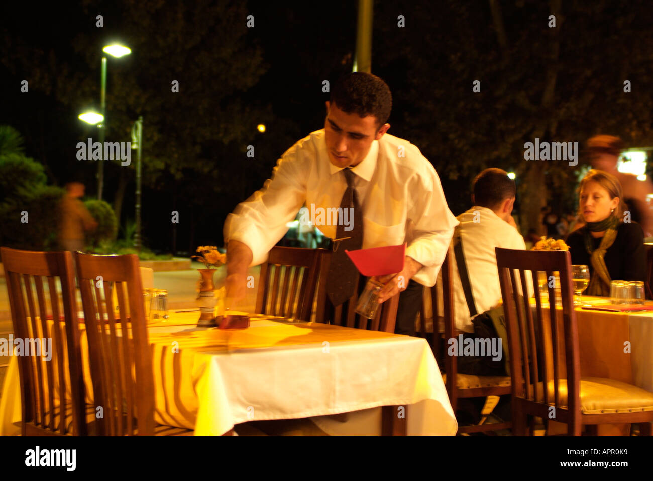 Waiter cleaning the table in Istanbul, Turkey Stock Photo - Alamy