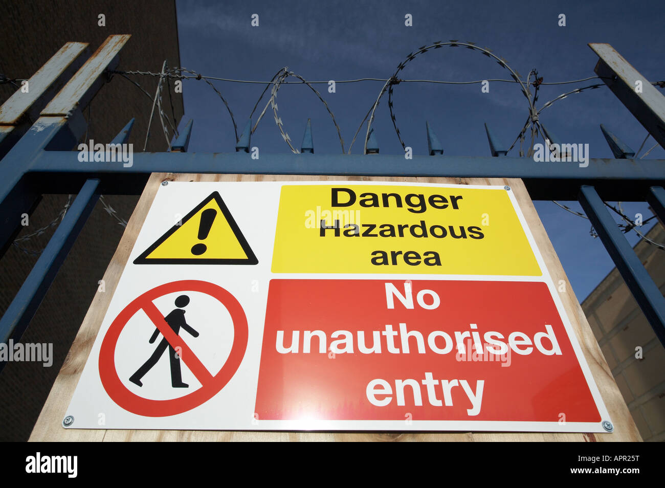 DANGER HAZARDOUS AREA NO UNAUTHORISED ENTRY Health and safety warning ...