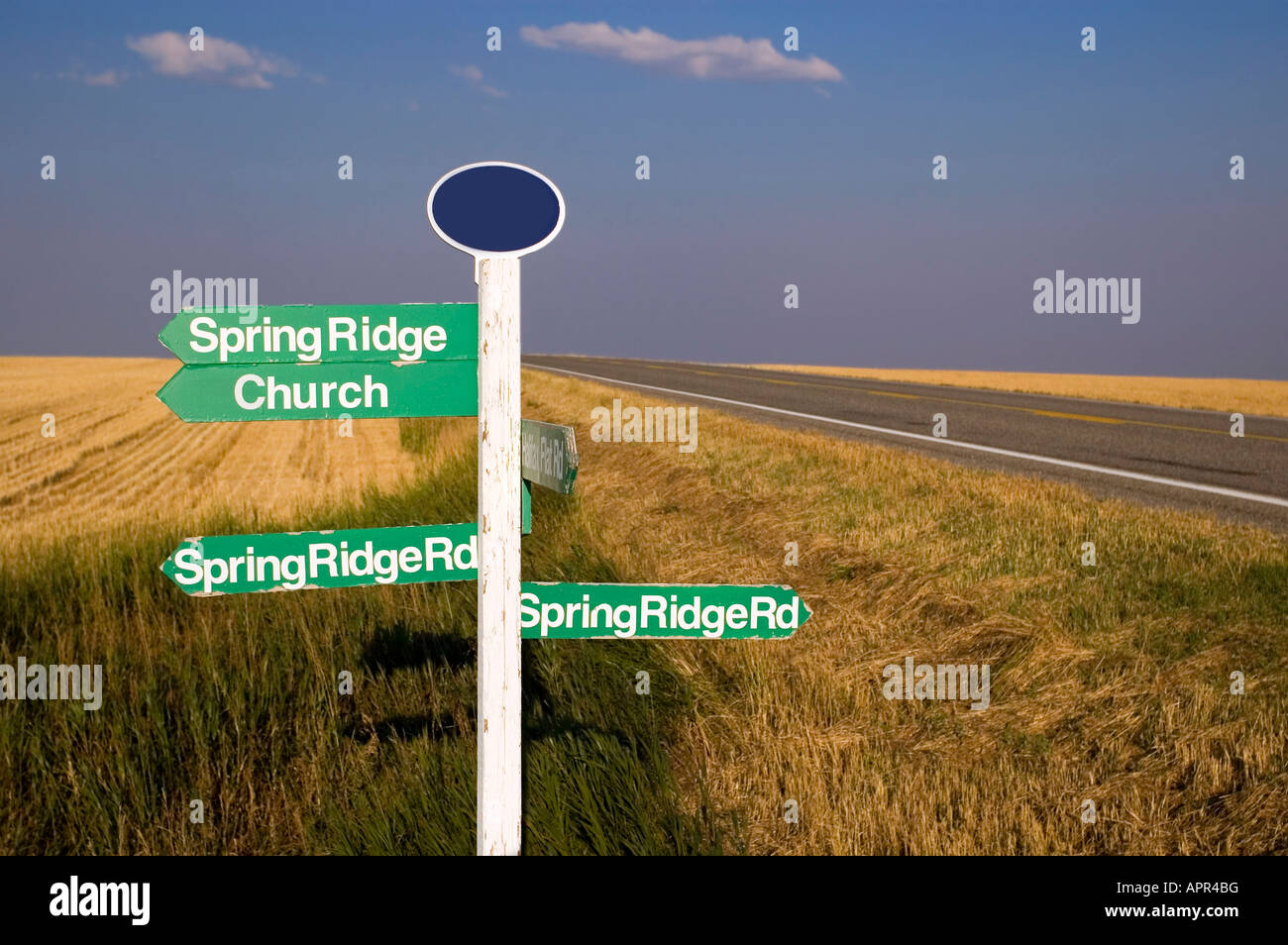 Green road sign with multiple destinations Stock Photo - Alamy