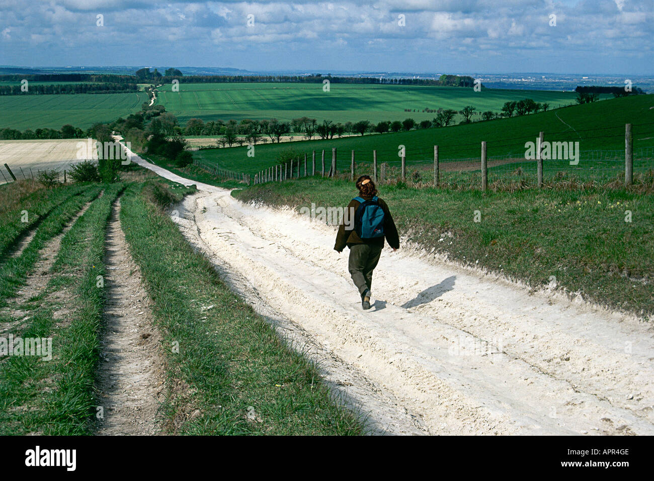 A person walking along the Ridgeway Path at Uffington Stock Photo - Alamy