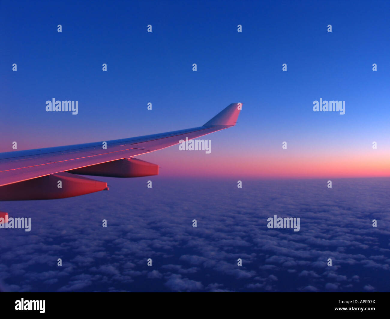 Sunset as it seen from the window of a passenger airplane Stock Photo ...
