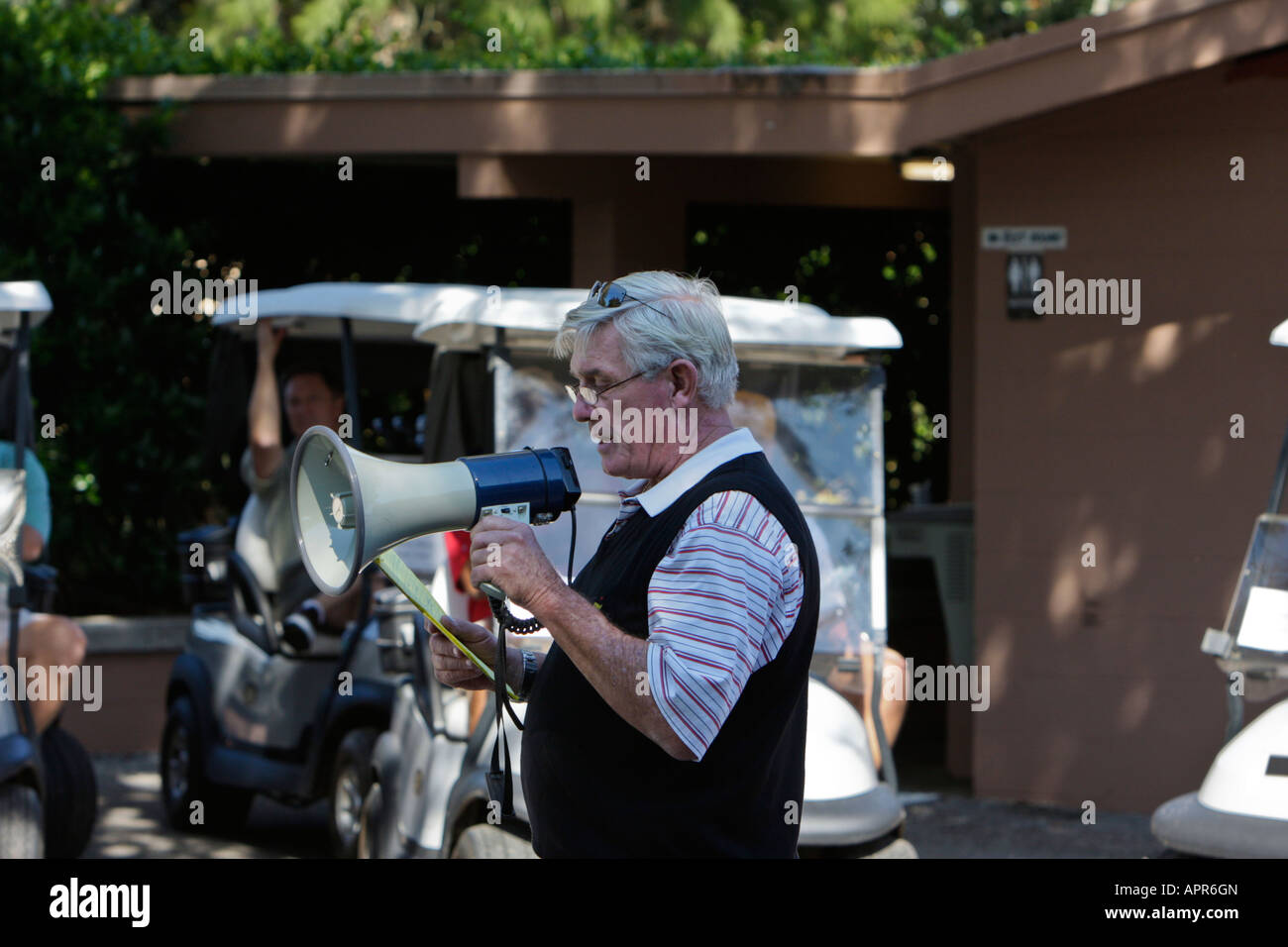 Man Using Bullhorn for Announcement Stock Photo - Alamy