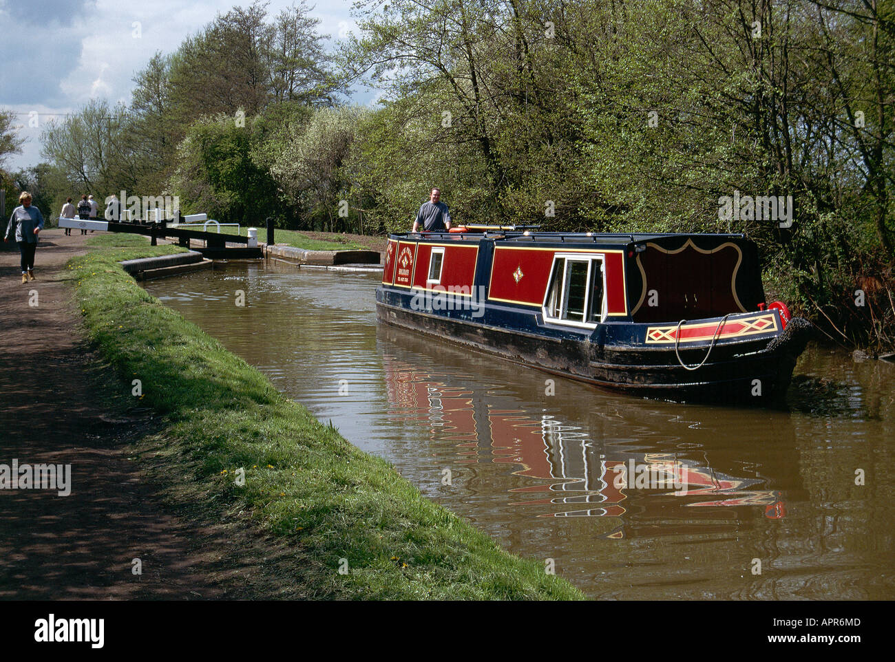 Narrow boats still navigate the many locks along the section of the ...
