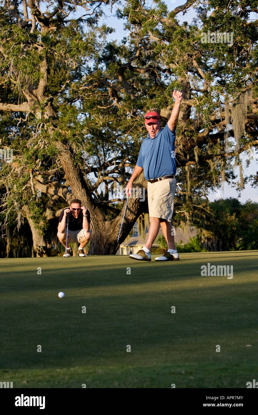Men Playing Golf Stock Photo - Alamy