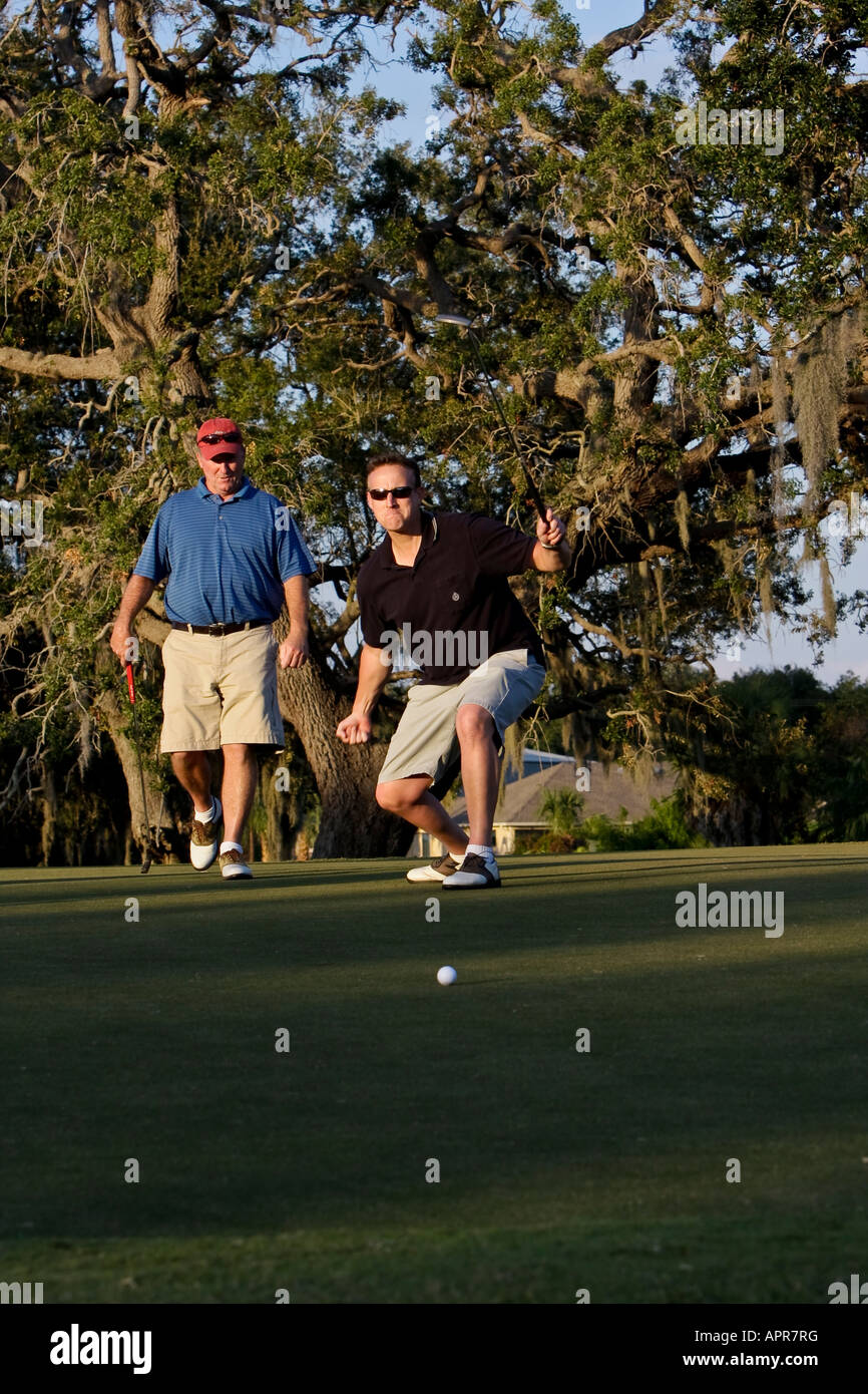 Man Excited Playing Golf Stock Photo - Alamy