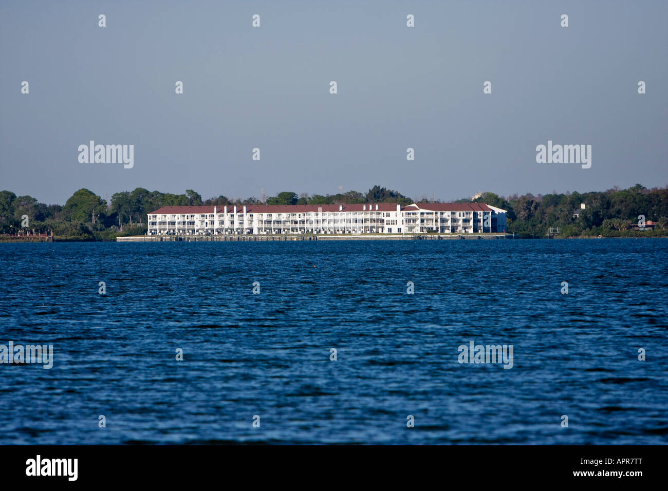 Water View of a Large Three Story Waterfront Building Stock Photo - Alamy