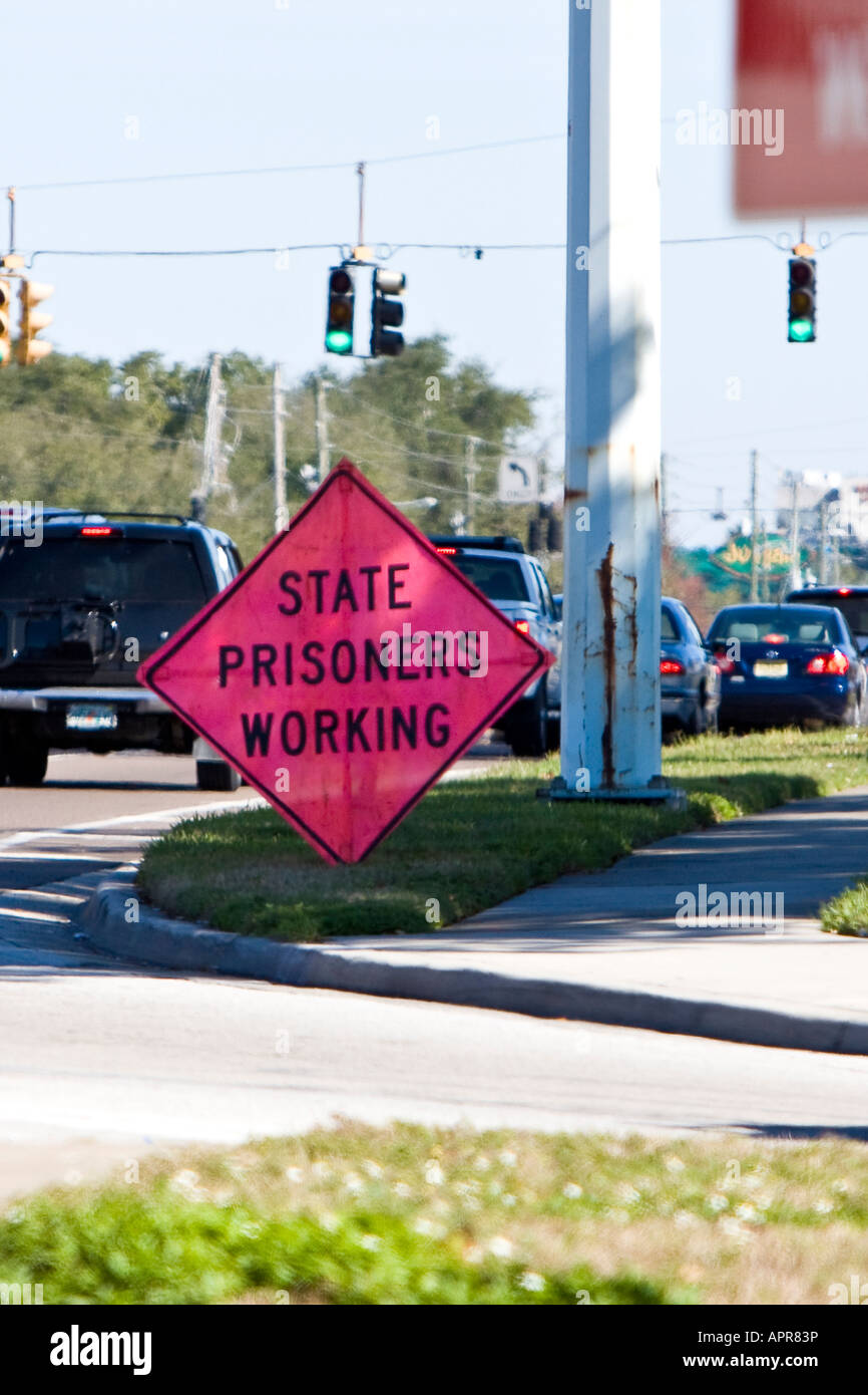 Prisoners Working Sign Stock Photo - Alamy