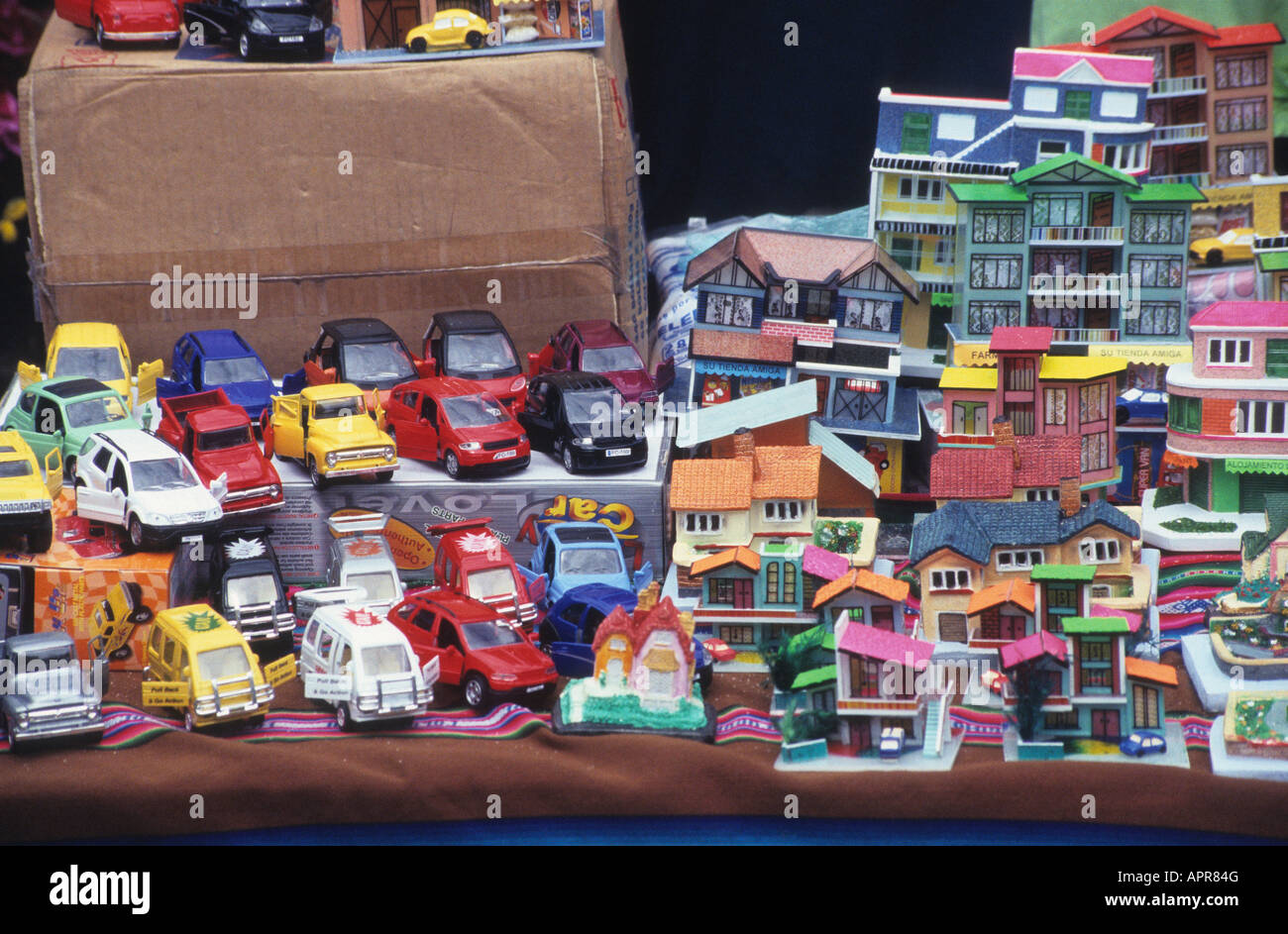 Miniature vehicles and houses on stall, Alasitas festival, La Paz ...