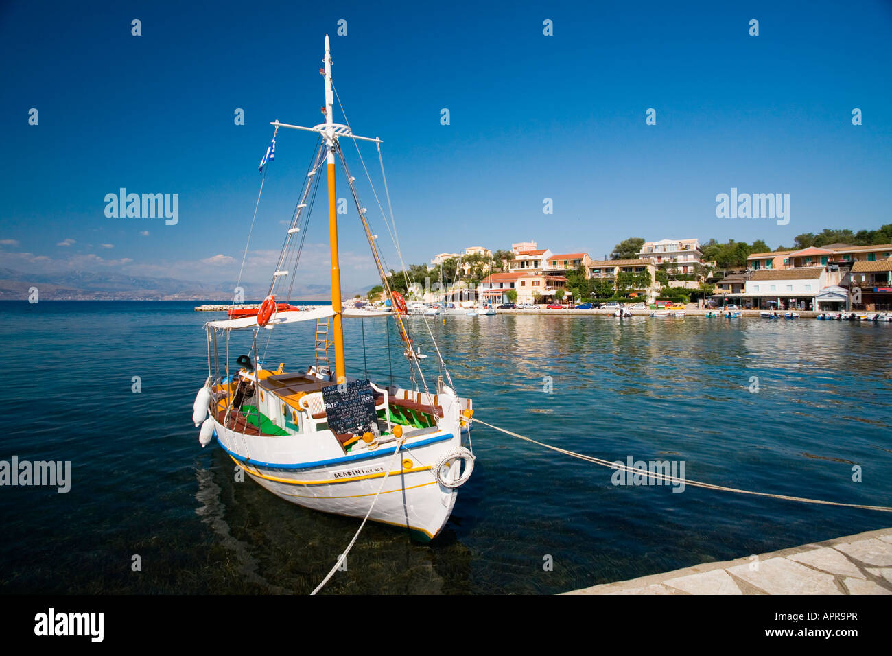 Greek fishing boat, Kassiopi Harbour, Corfu, Greece Stock Photo - Alamy
