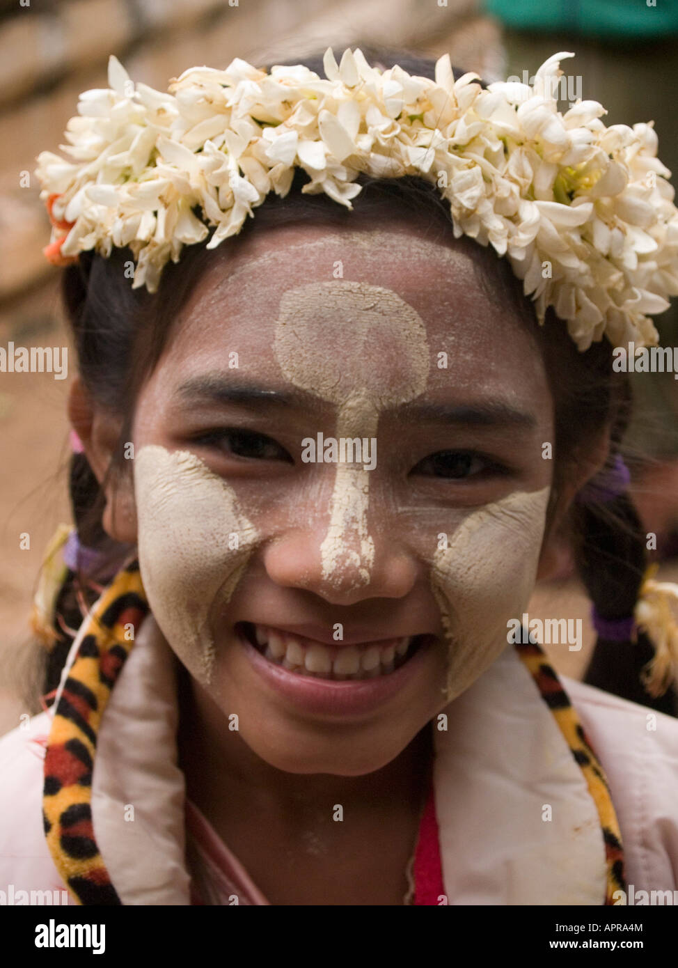 cute Burmese girl with thanaka face paste and a big smile Stock Photo ...