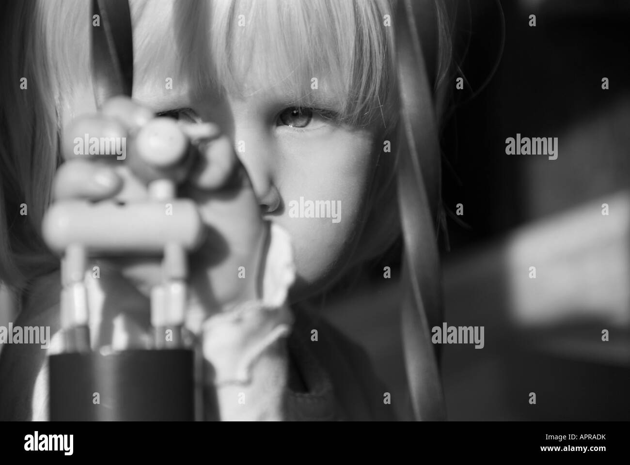 Image Of A Two Year Old Girl As She Is Sitting Staring Through The image-of-a-two-year-old-girl-as-she-is-sitting-staring-through-the
