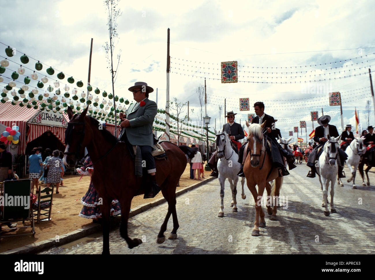 Riders parading with their horses at the Seville Spring Fair in Spain ...