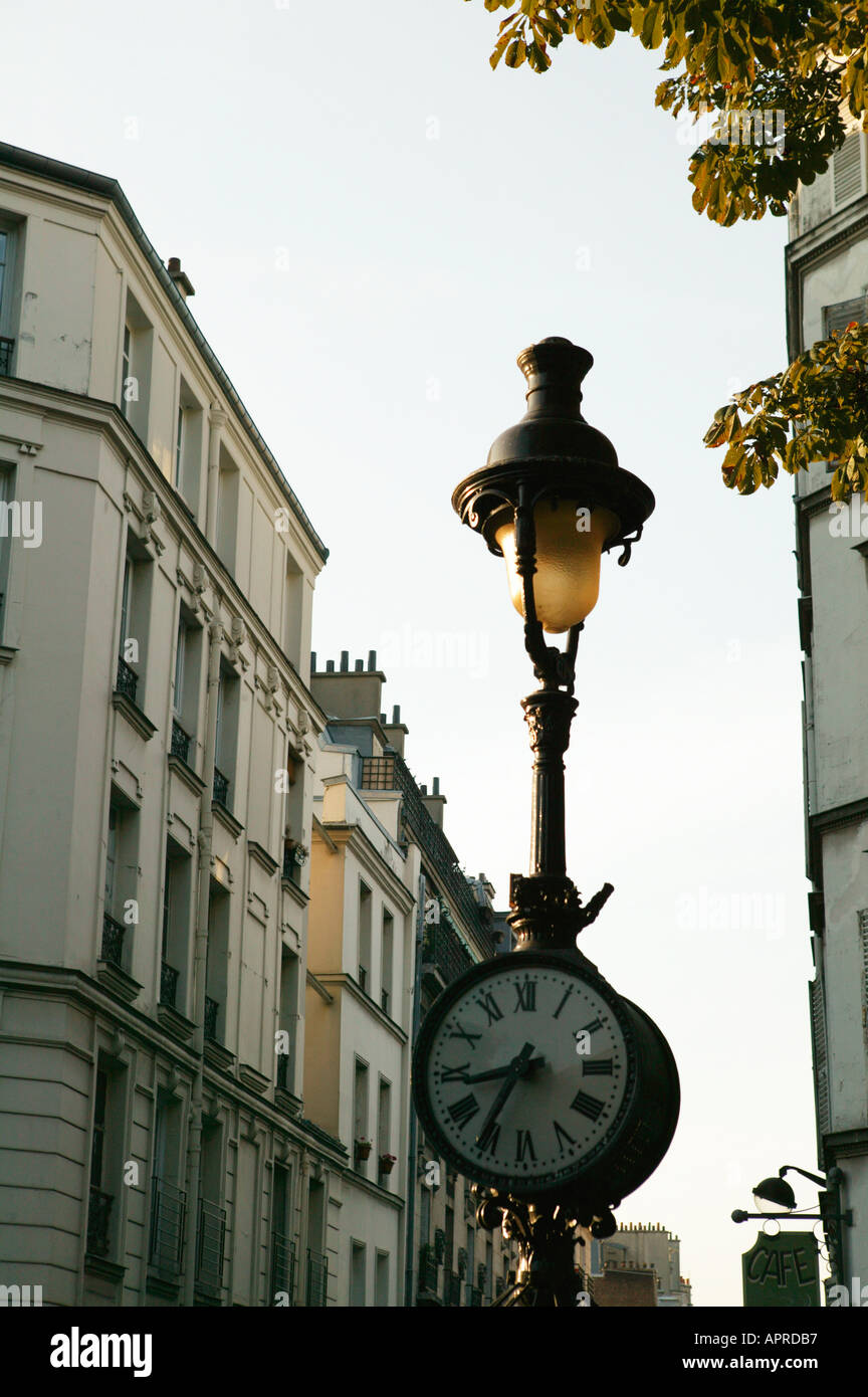 Traditional street clock in Paris Stock Photo - Alamy