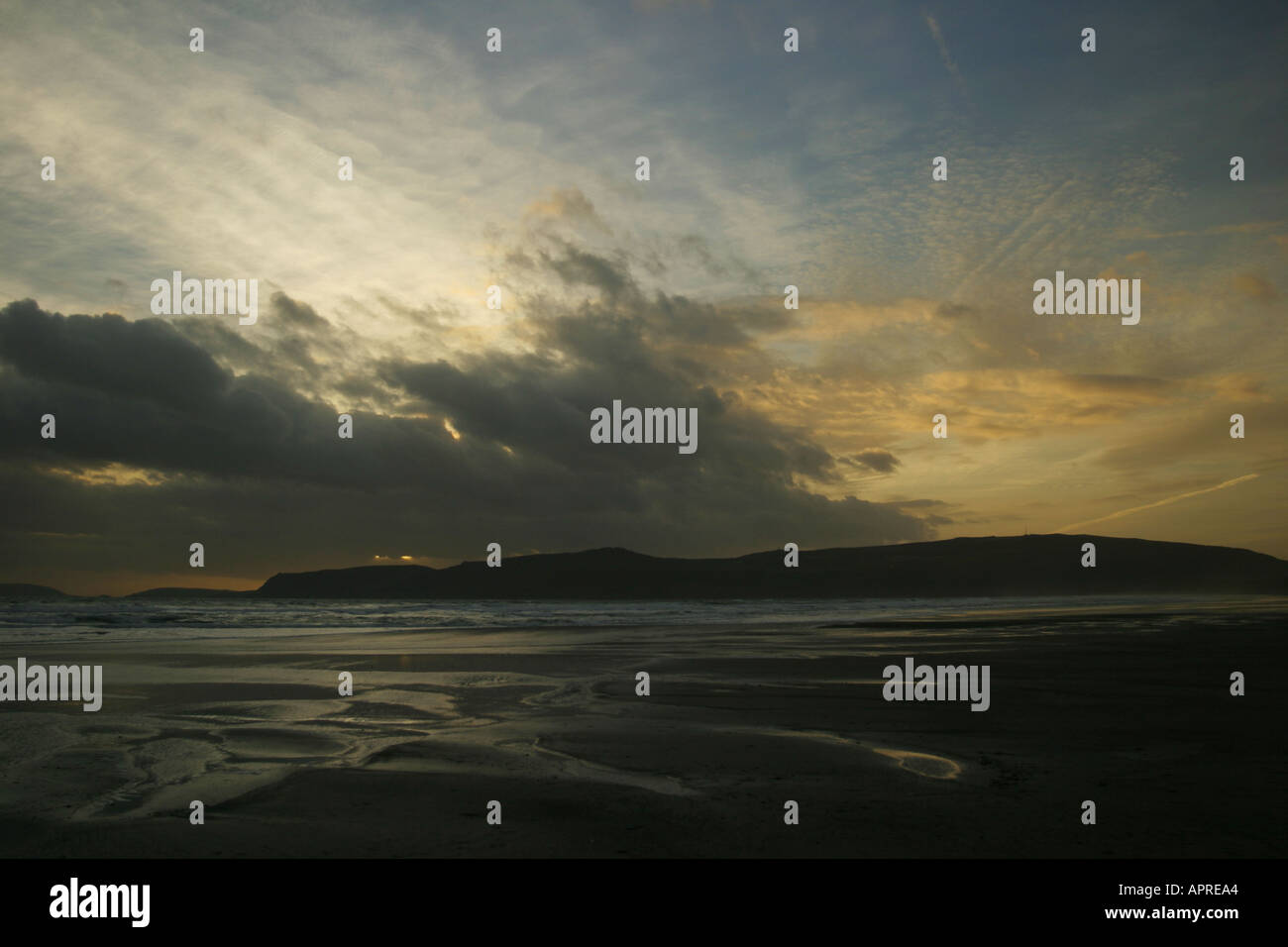 sunset on welsh beach Stock Photo - Alamy