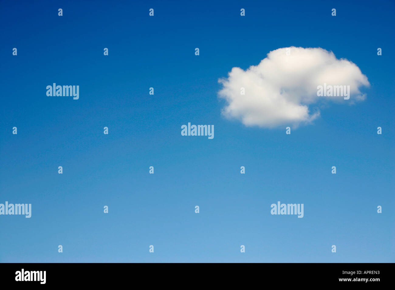A single cloud in a blue sky Stock Photo - Alamy