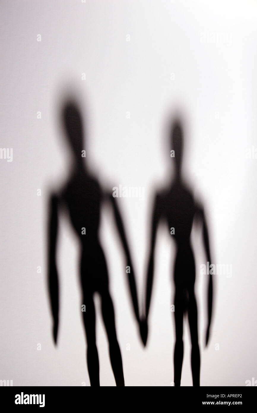Shadows of a couple holding hands Stock Photo - Alamy