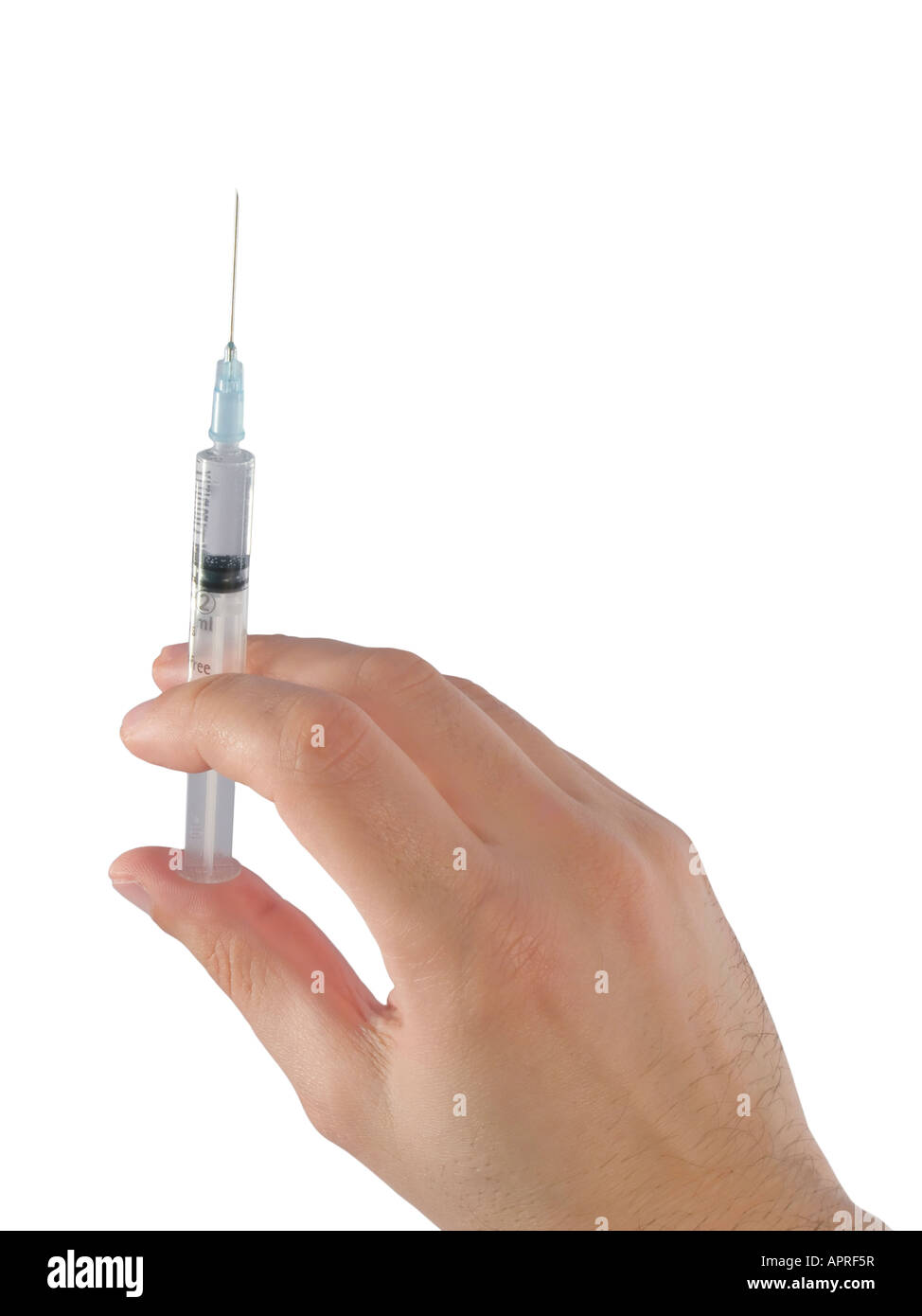 Hand holding syringe Stock Photo - Alamy