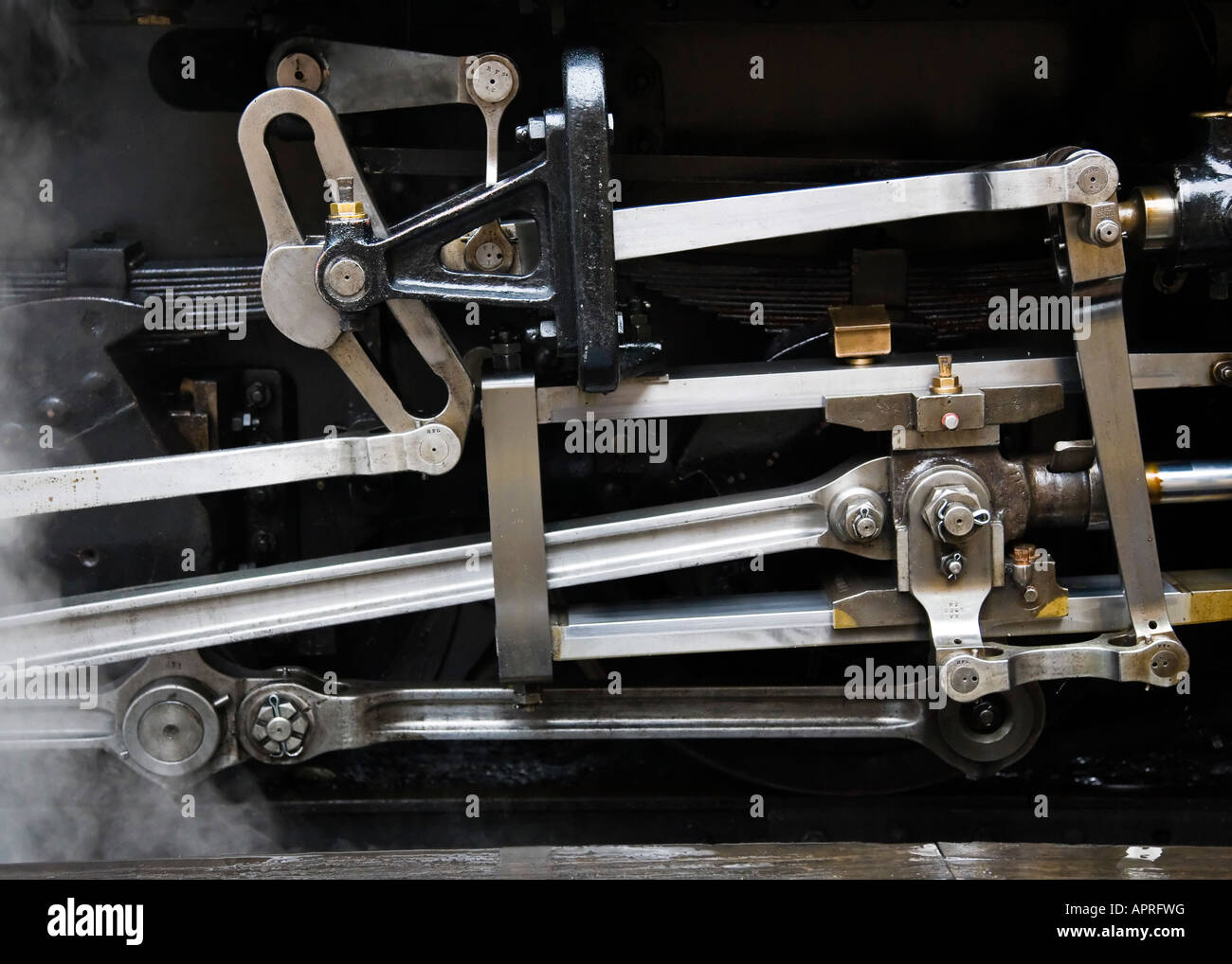 Close-up of the pistons and levers on the outside of a Victorian steam ...