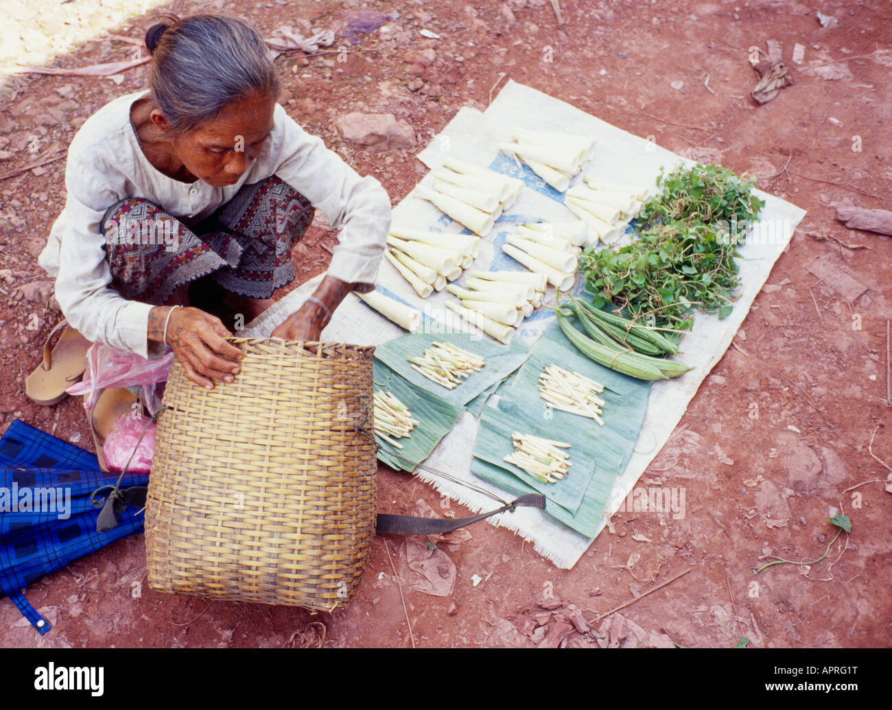 old lady market stall, Laos Stock Photo - Alamy