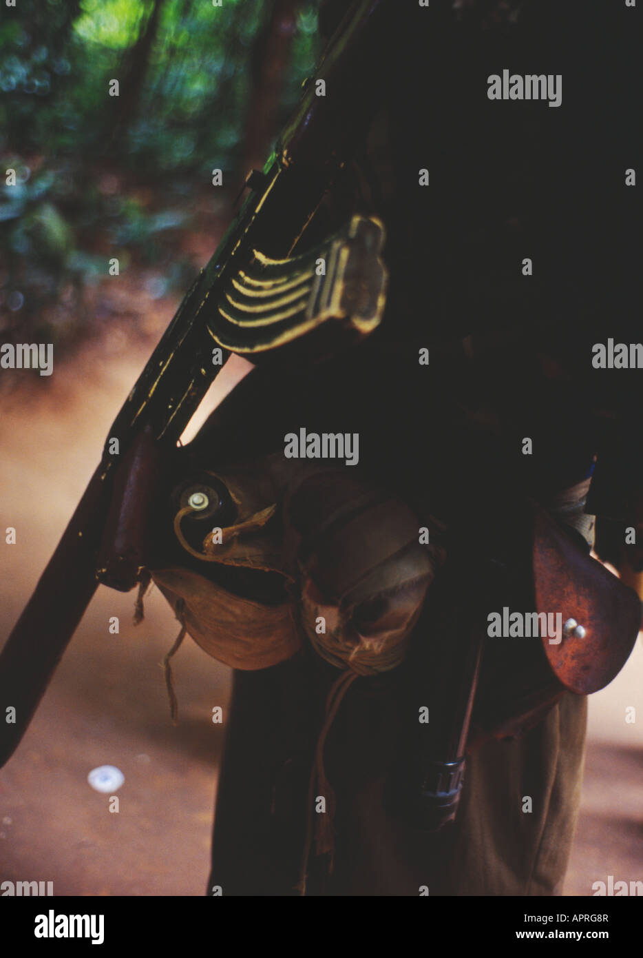 Gun over shoulder hi-res stock photography and images - Alamy