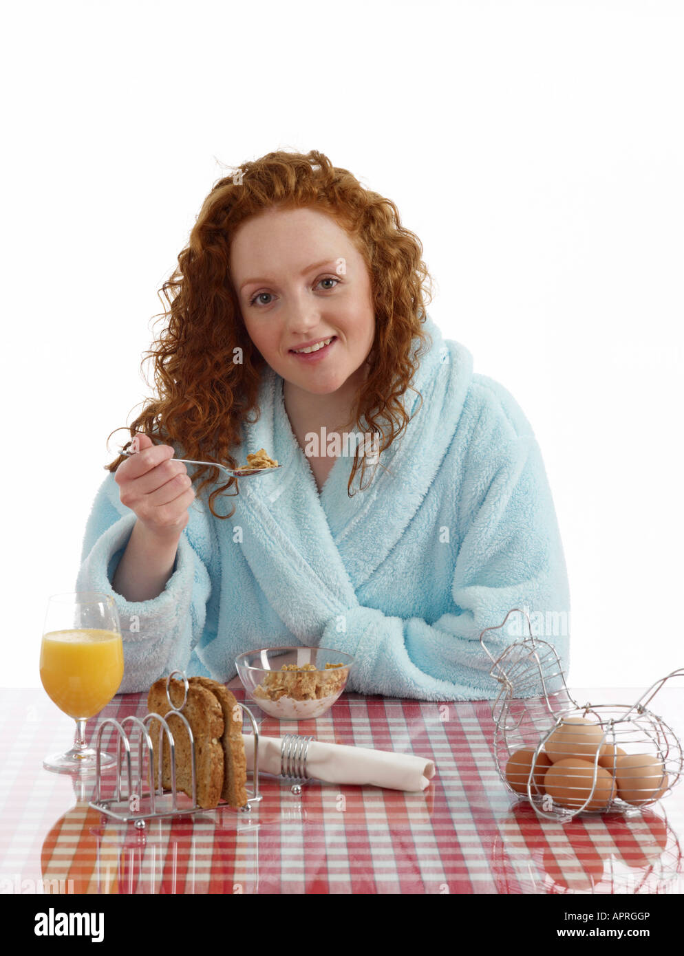 Woman eating all bran breakfast cereal hi-res stock photography and ...