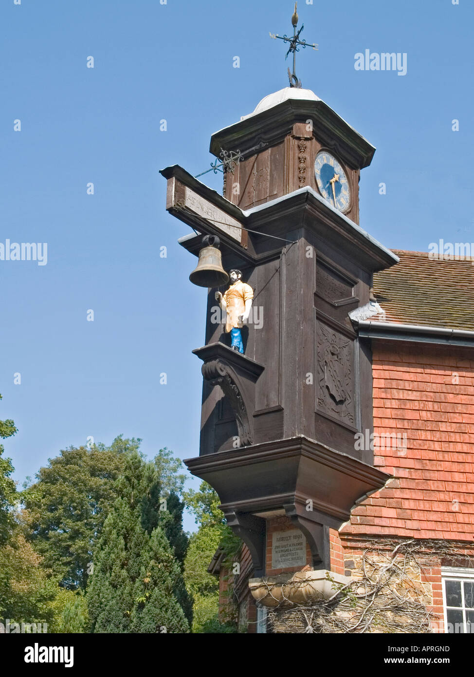 Historic clock overhanging the road at Abinger Hammer Surrey England ...