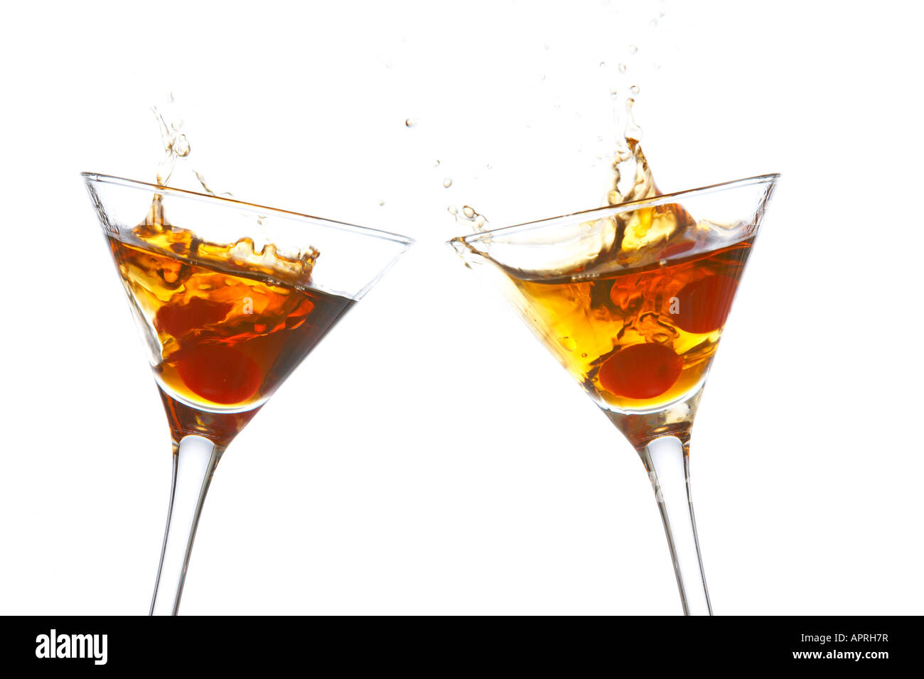 Toast with two cocktail glasses on white background Stock Photo - Alamy