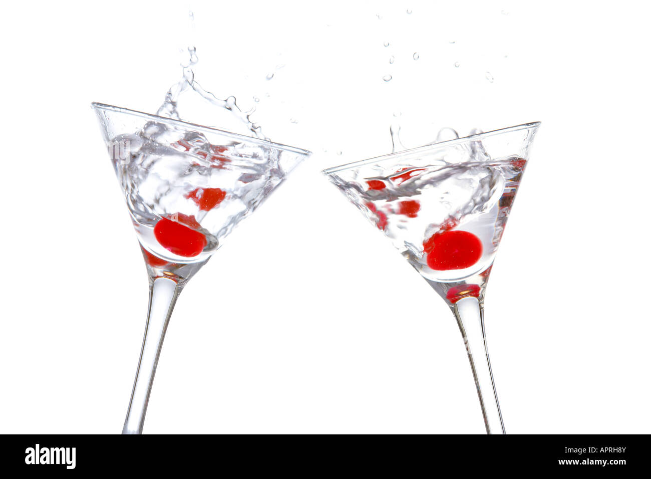 Toast with two cocktail glasses on white background Stock Photo - Alamy