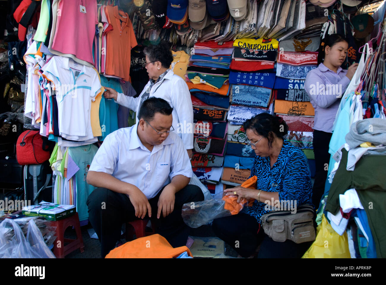 bartering at clothes' stall at Psar Thmei Market (also know as New ...