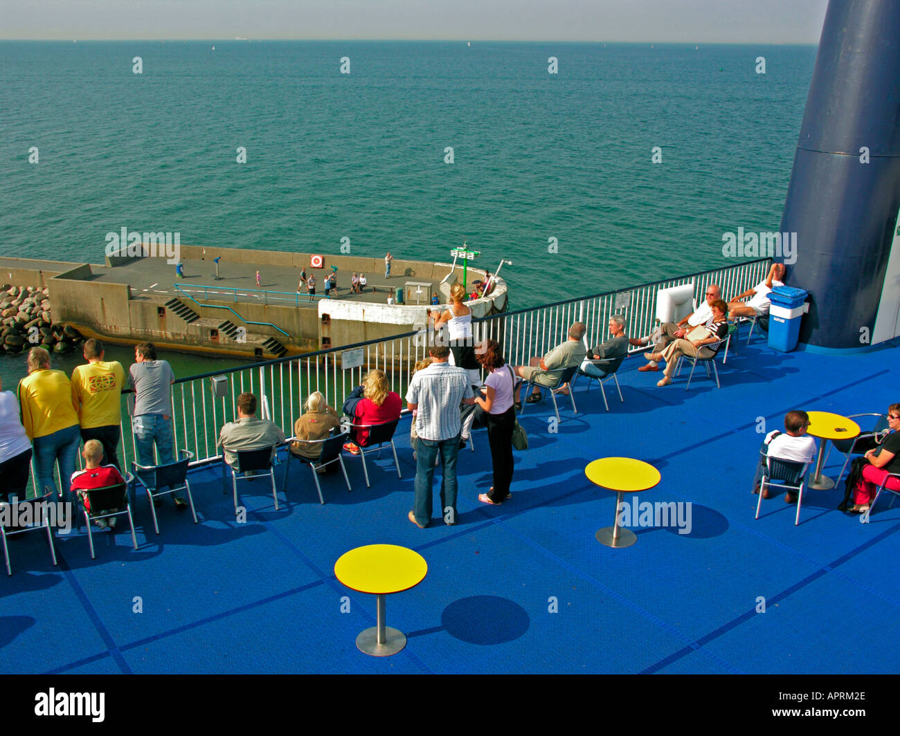 passangers on sundeck of the ferry of Scanlines on see from Puttgarden ...