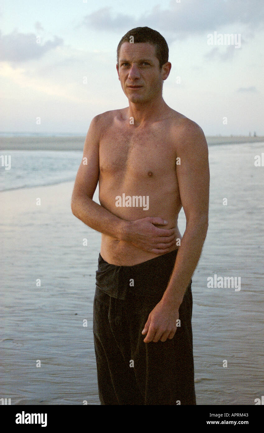 man on beach Stock Photo - Alamy