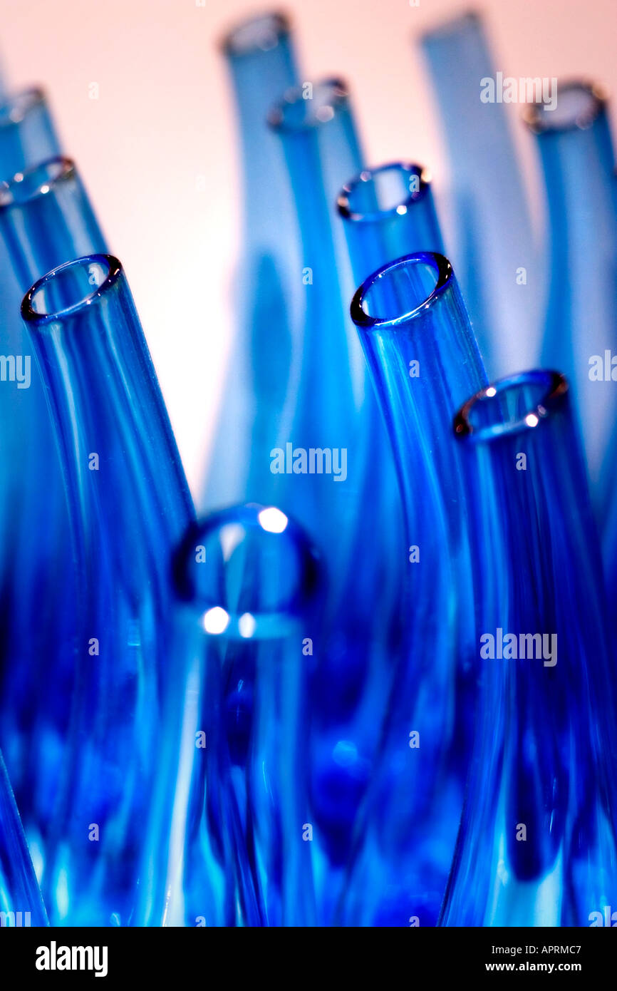 Arrangement of blue flasks on display at store Stock Photo - Alamy