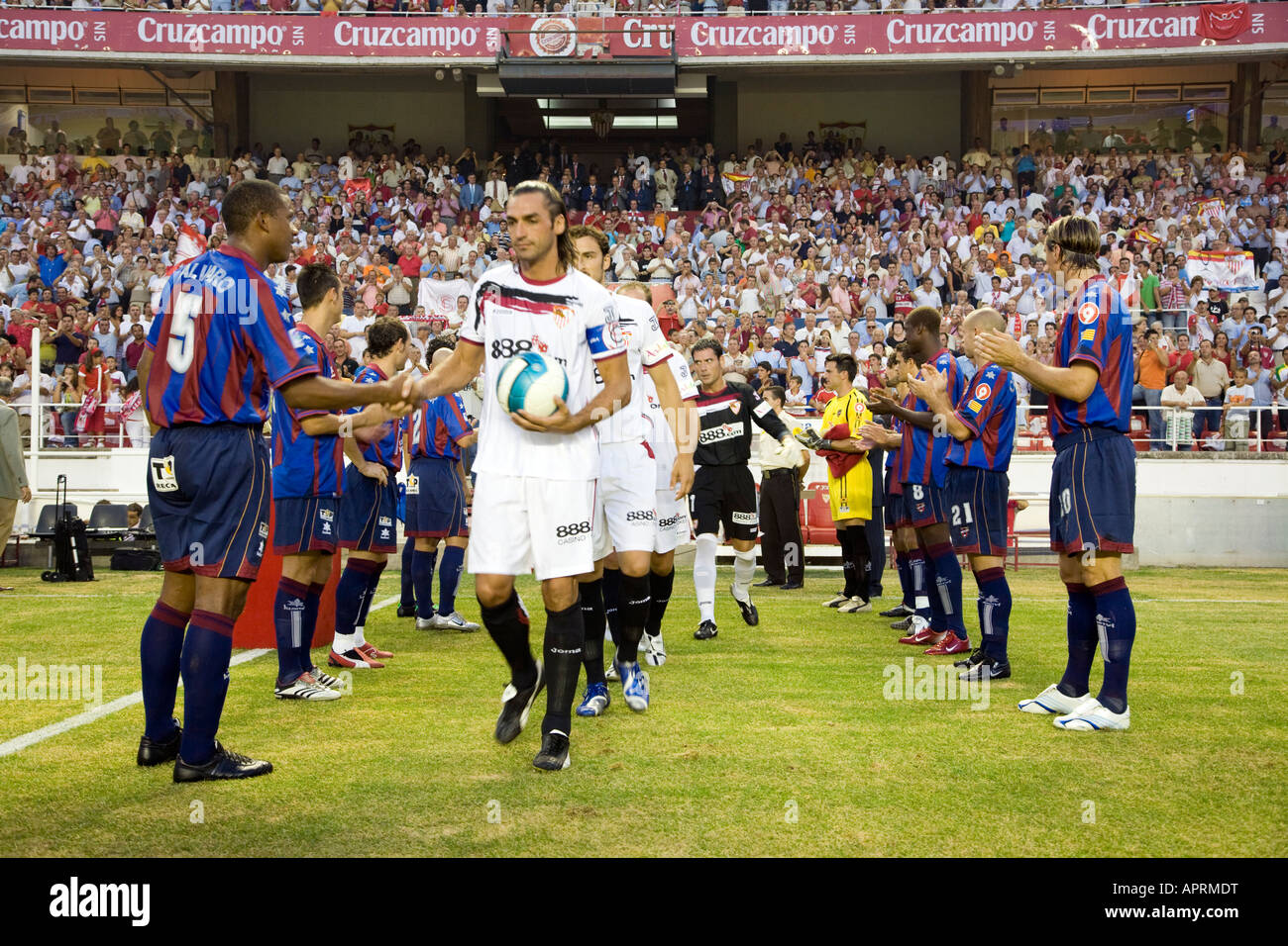 Levante players performing a guard of honour for Sevilla ones who had ...