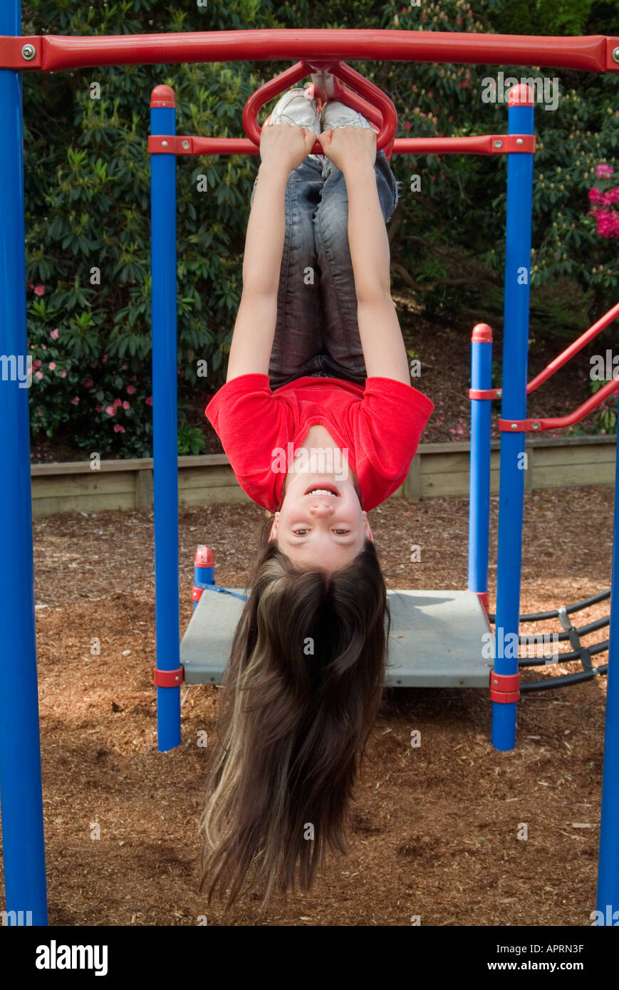 Girl hanging upside down from hi-res stock photography and images - Alamy