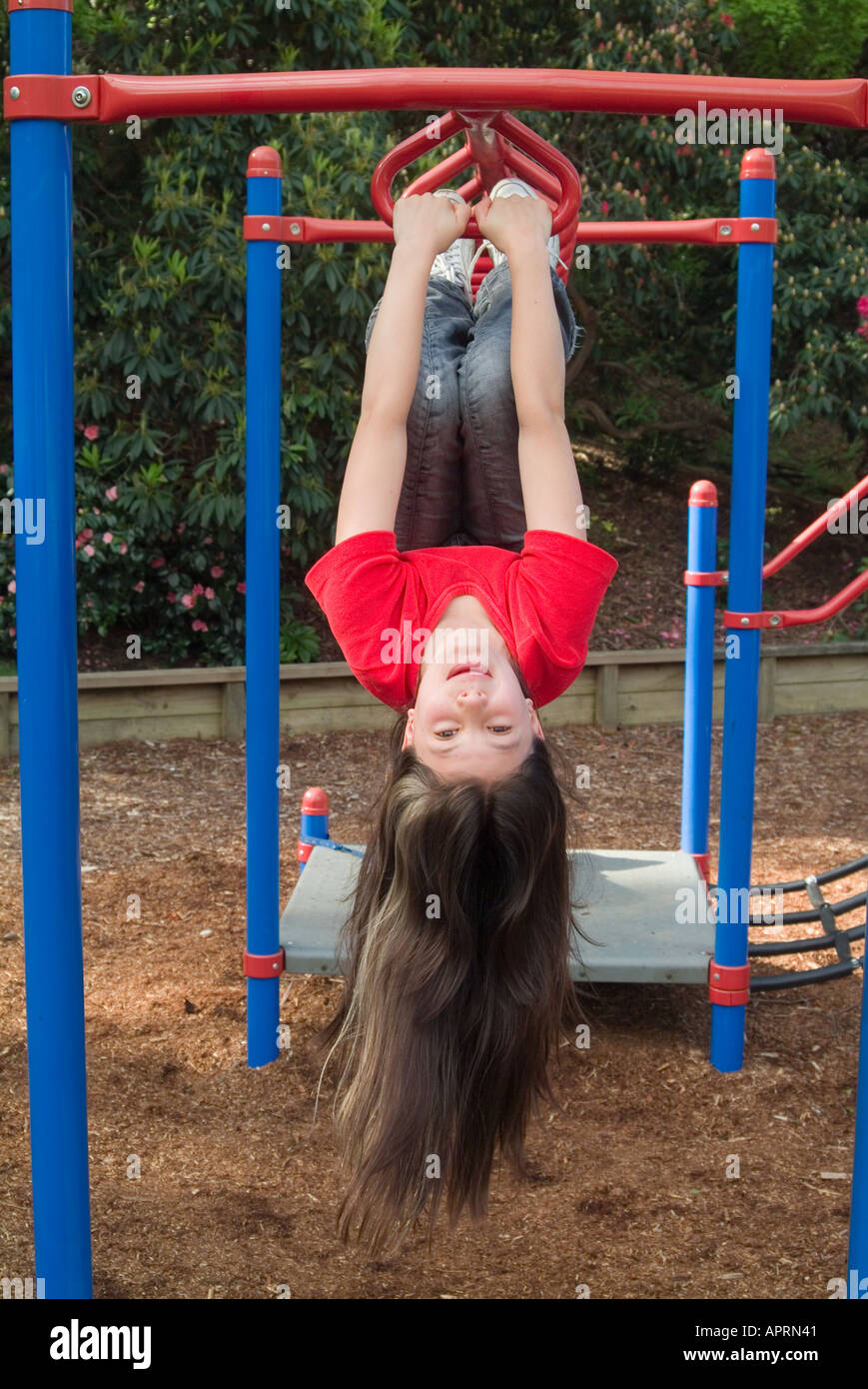Girl hanging upside down from hi-res stock photography and images - Alamy
