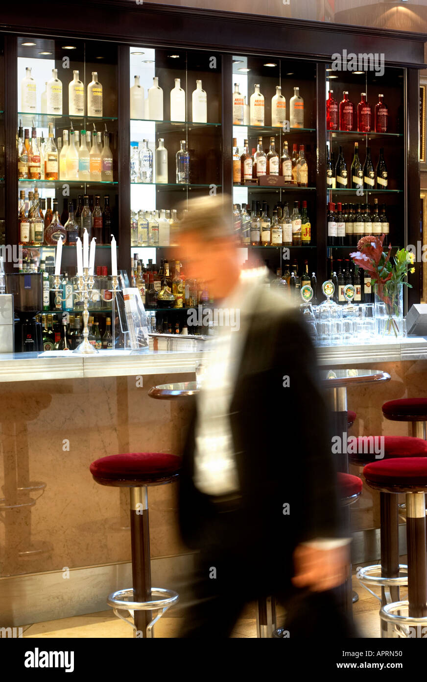 Saloon man bottle hi-res stock photography and images - Alamy