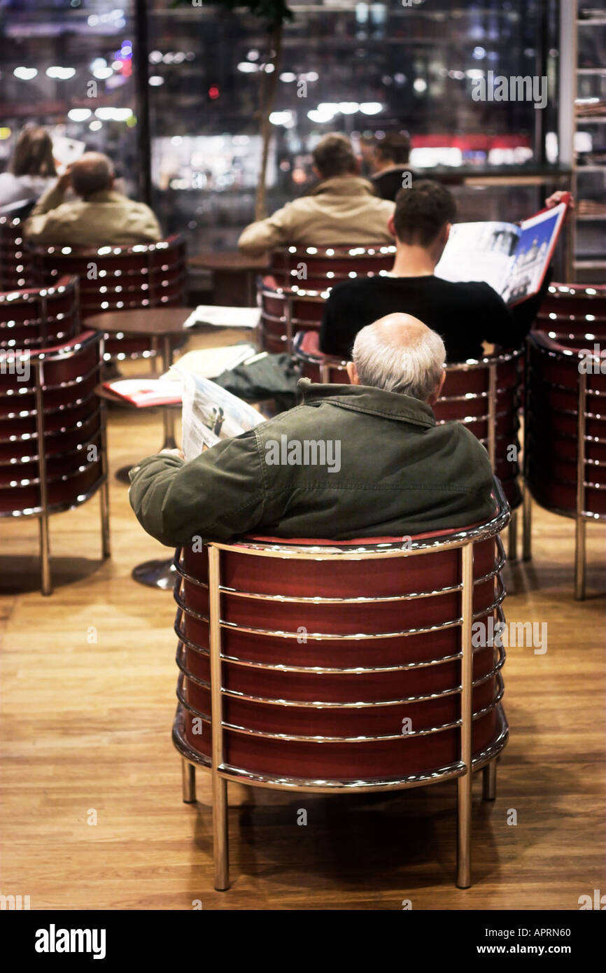Man reading in library Stock Photo - Alamy