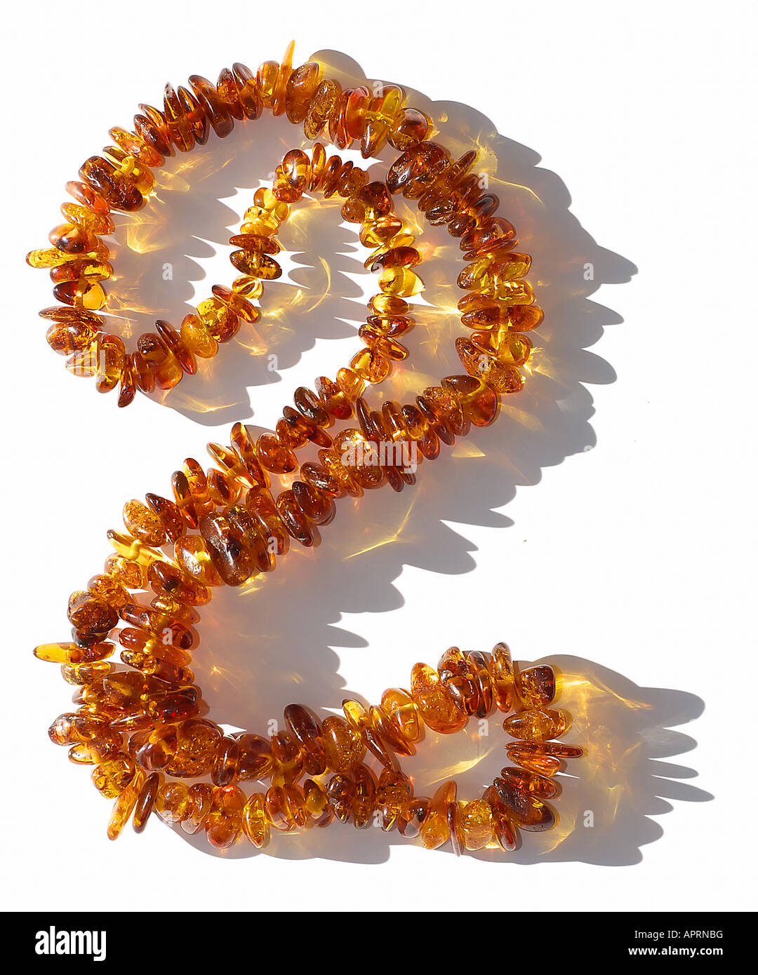 symbol made with Amber Beads Stock Photo - Alamy