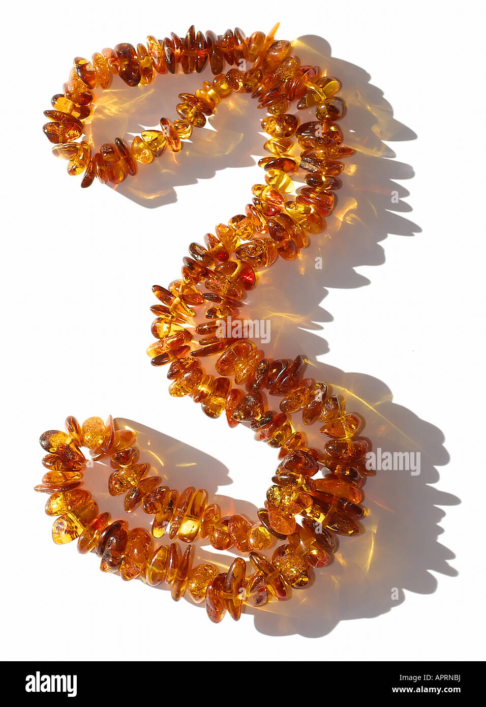 symbol made with Amber Beads Stock Photo - Alamy