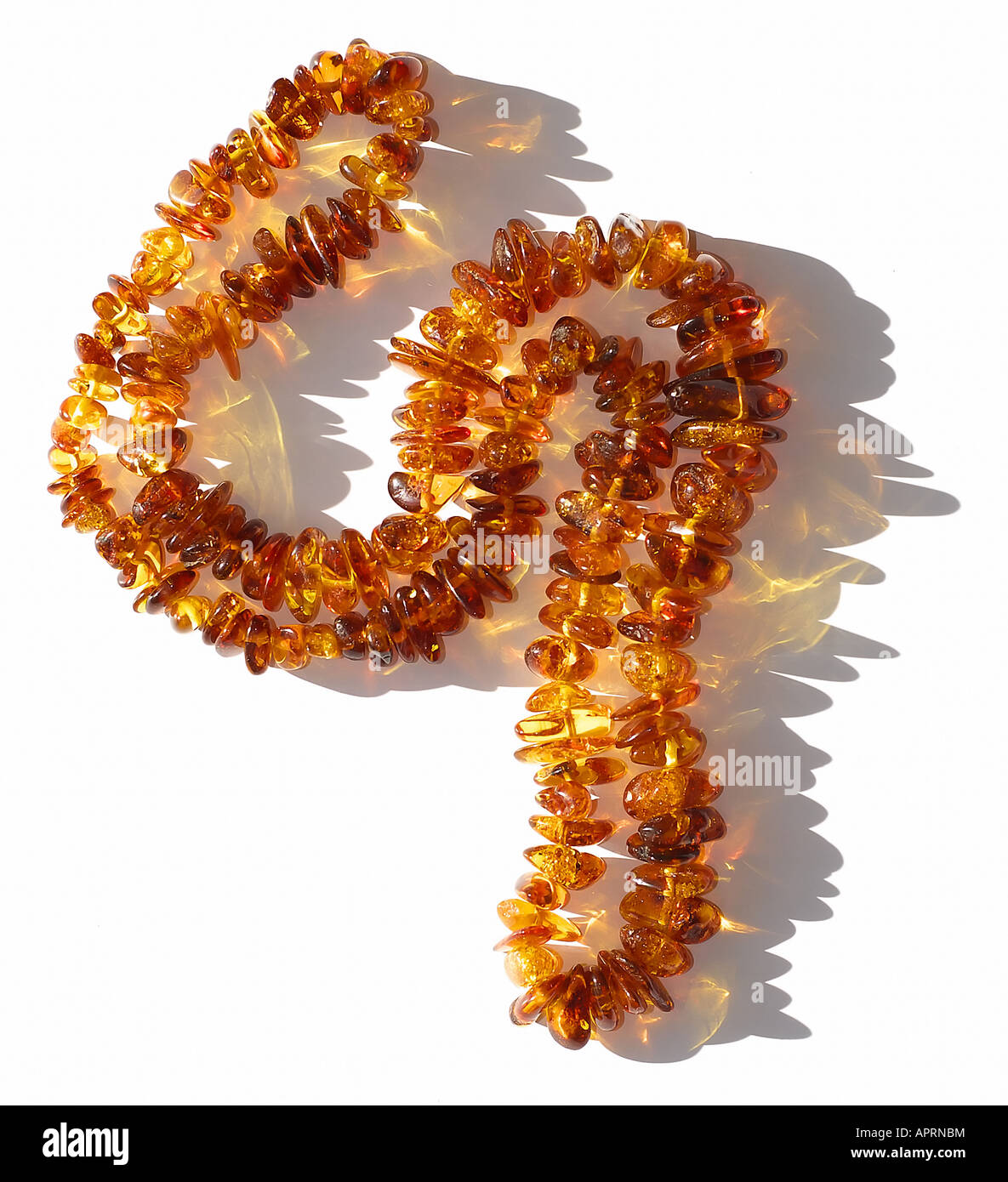 Amber beads Cut Out Stock Images & Pictures - Alamy