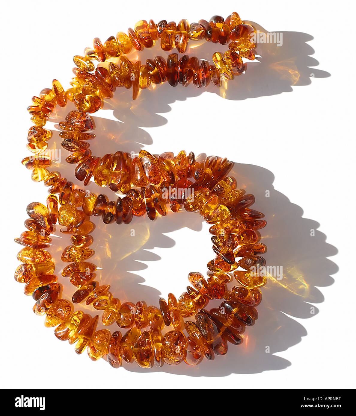symbol made with Amber Beads Stock Photo - Alamy